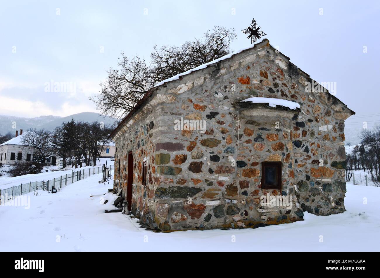 an old stone church in the snow Stock Photo - Alamy