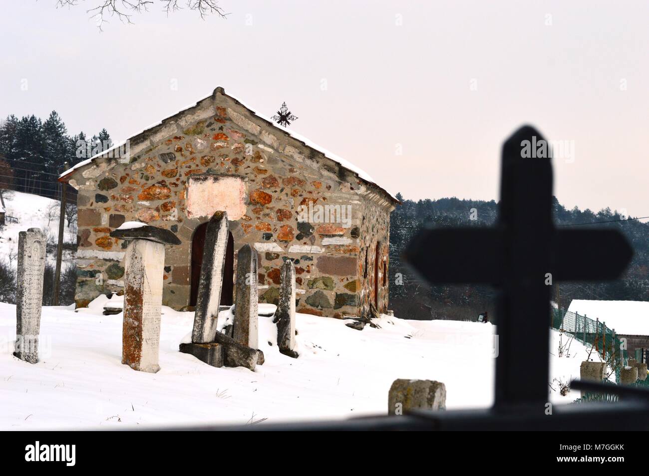 an old stone church in the snow Stock Photo - Alamy