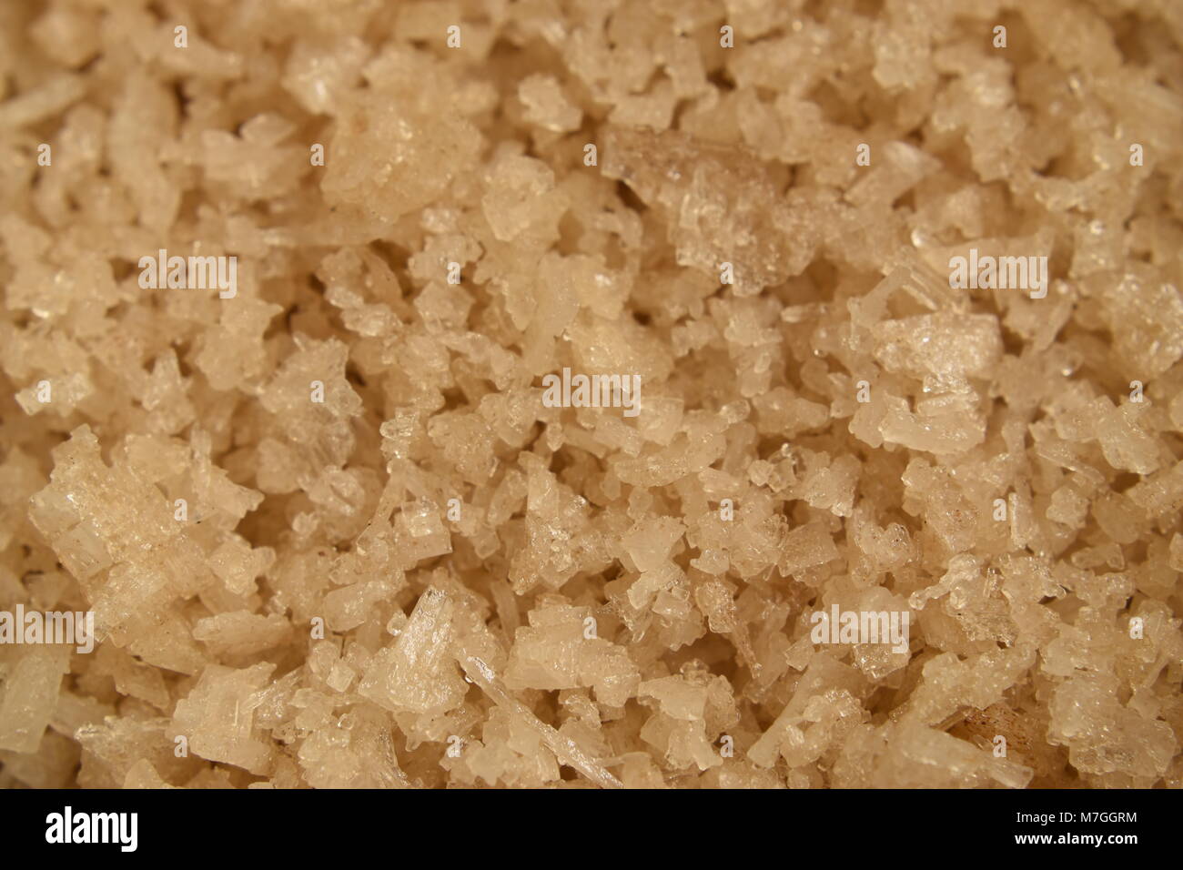 Closeup background of brown salt crystals in a heap Stock Photo - Alamy