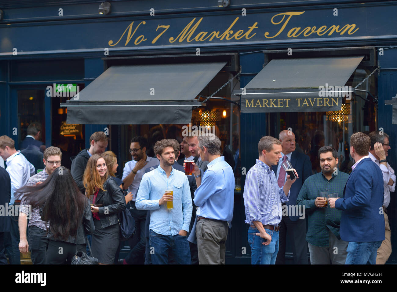 Business casual dressed employees enjoying after work drinks at No7 ...