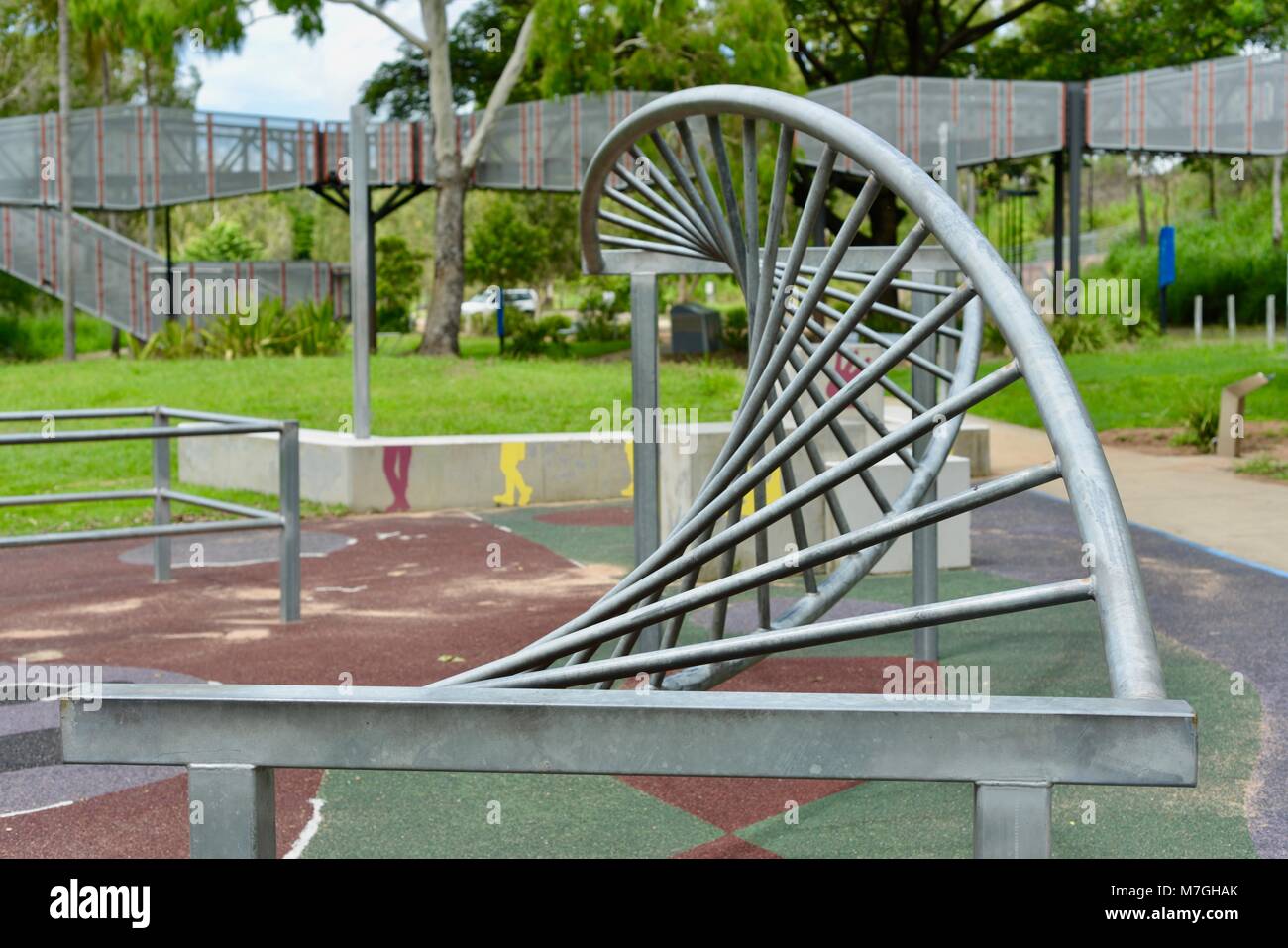 Childrens playground area with abstract turning rotating monkey bars ...