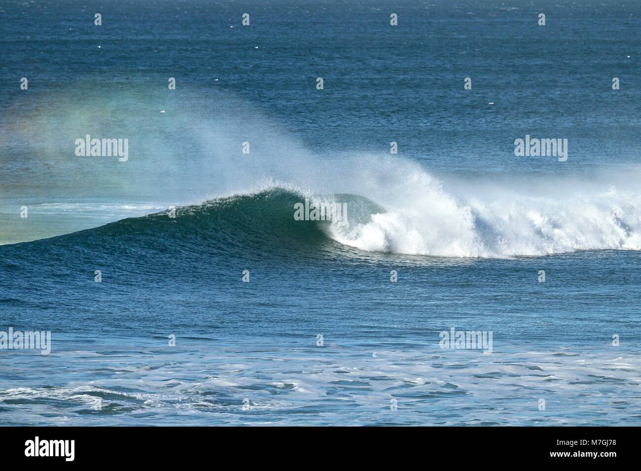 offshore wind rainbow waves Stock Photo - Alamy