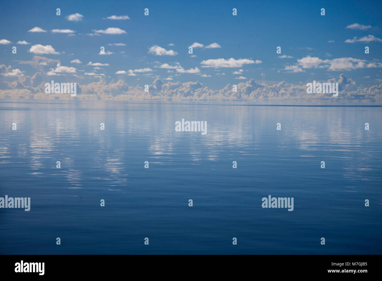 A glassy flat day on the ocean off the island of Yap, Micronesia Stock ...