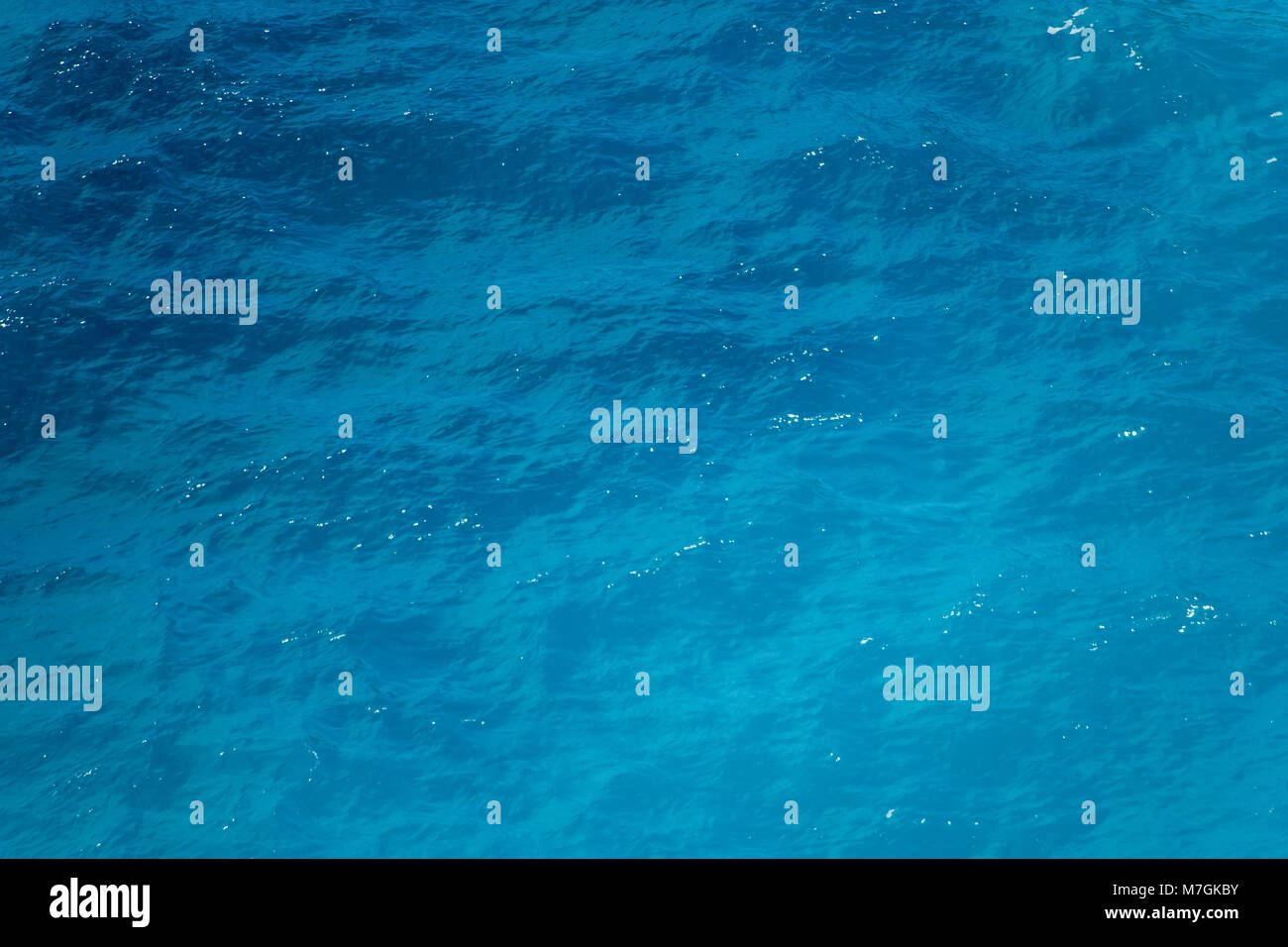 Blue sea water surface Stock Photo - Alamy