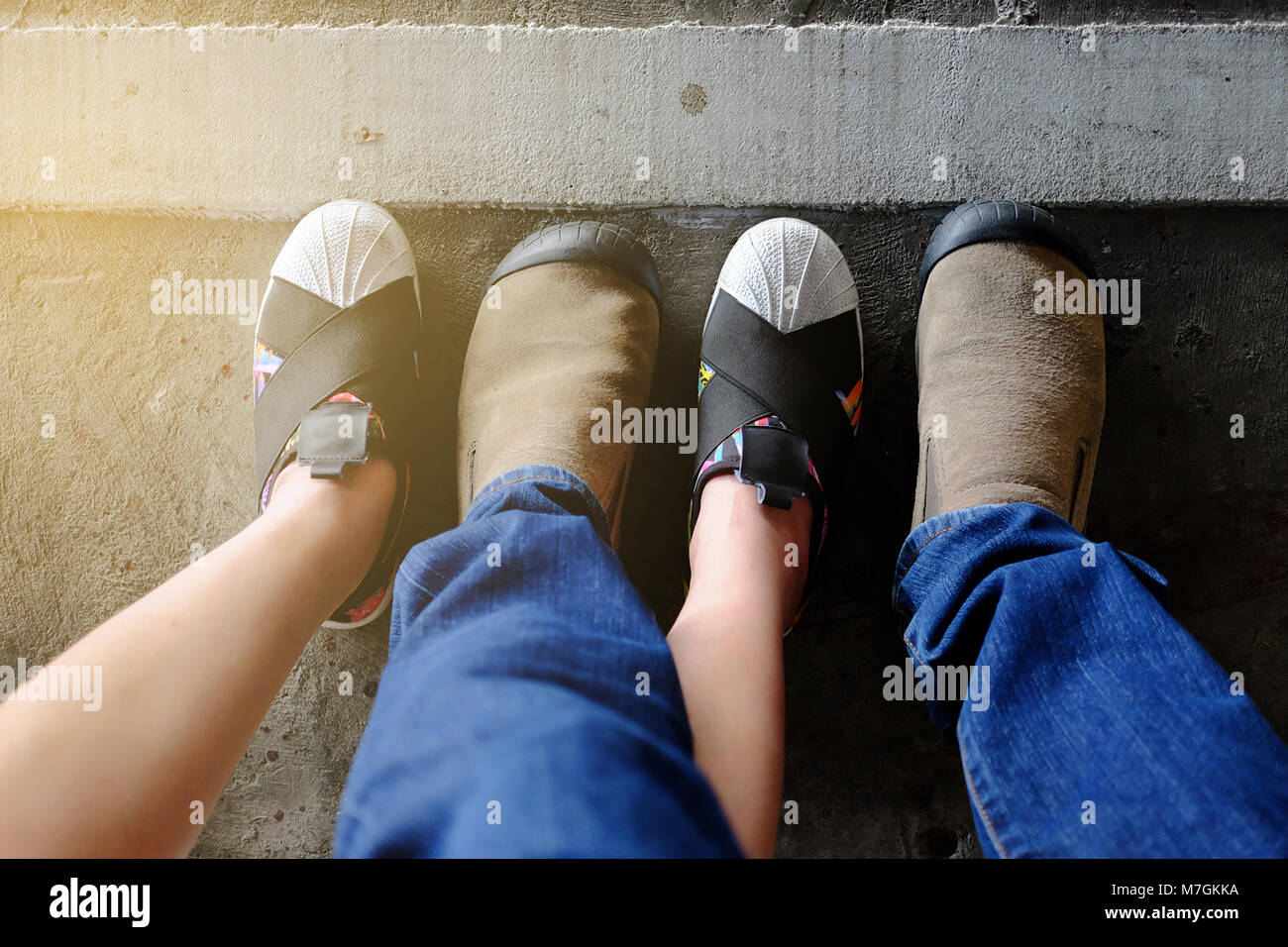 Man crossing legs standing hi-res stock photography and images - Alamy