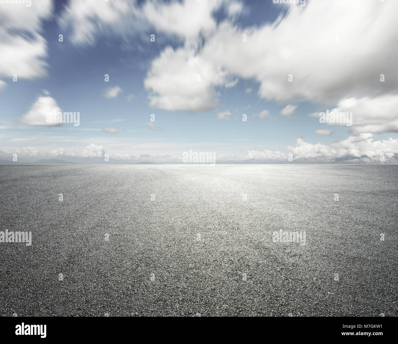 empty road with cloudy sky background Stock Photo - Alamy