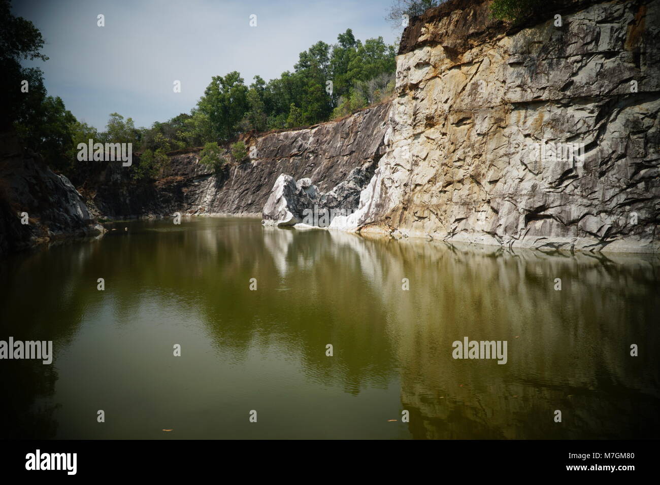 River flowing between hills Stock Photo - Alamy