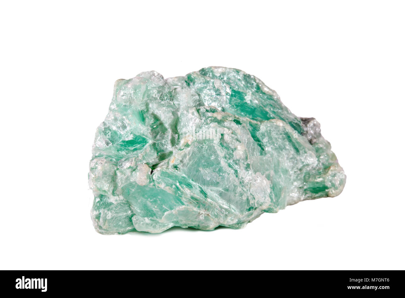 Macro shooting of natural gemstone. The raw mineral is talc. Isolated ...