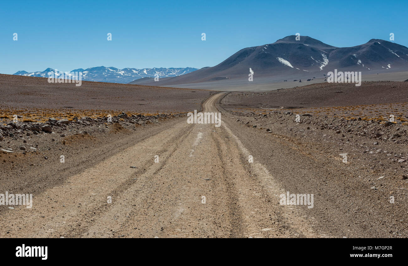 Unpaved road in the beautiful landscape of Bolivia, South America Stock ...