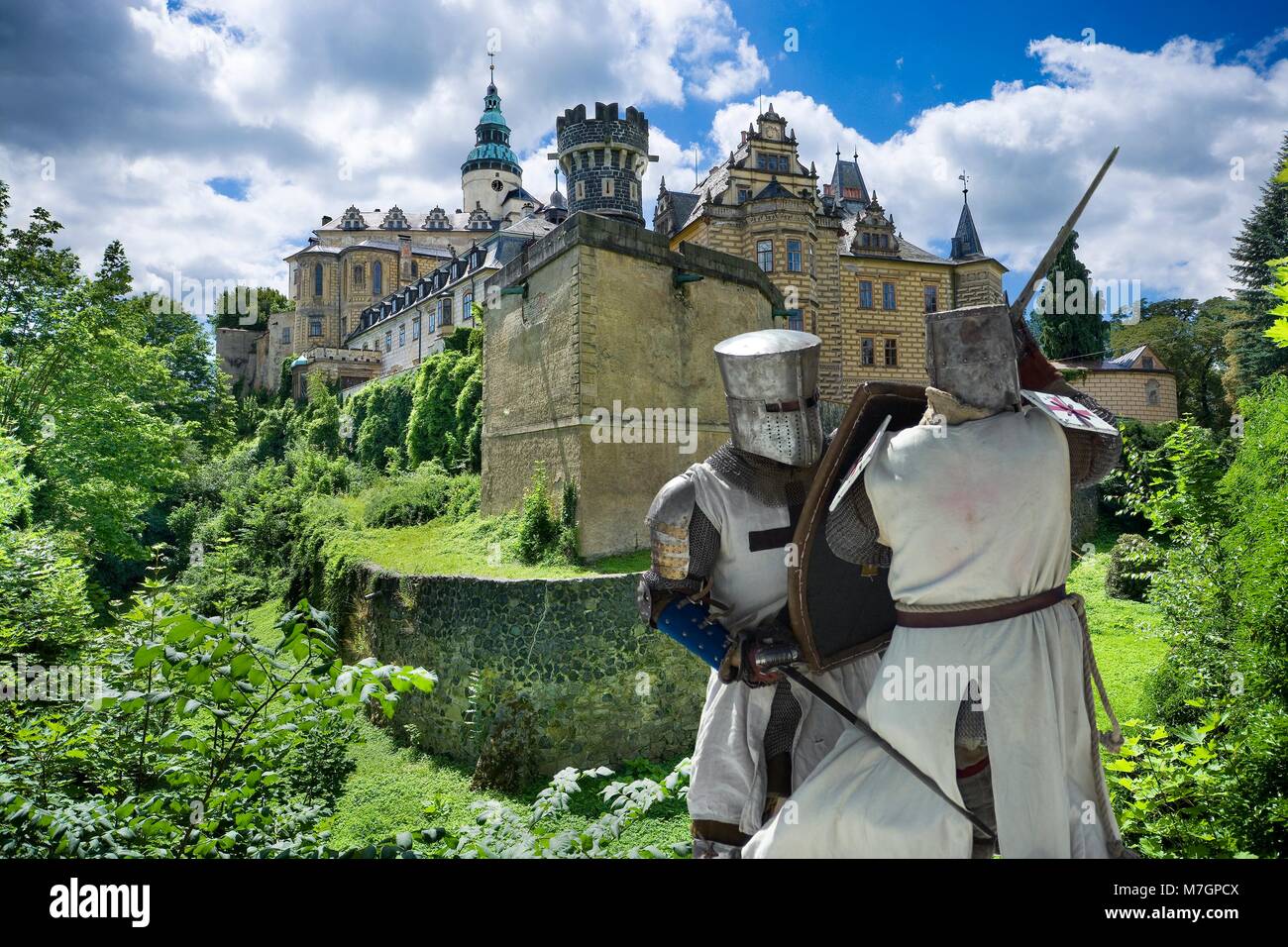 Medieval fighting knights in front of Gothic and Renaissance style ...