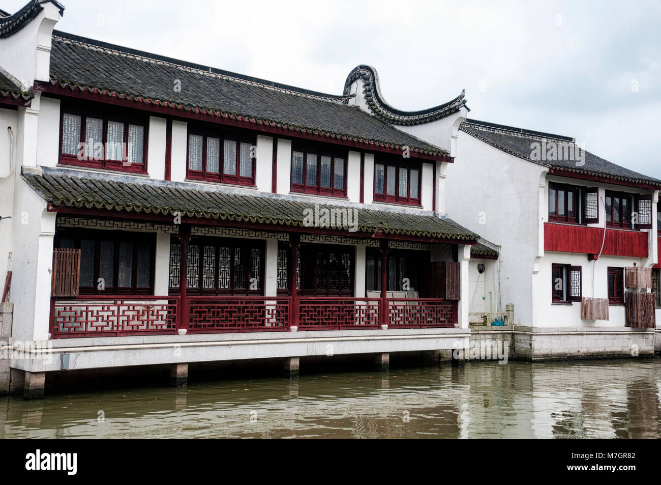Classical Chinese architecture and buildings lining the water canals of ...