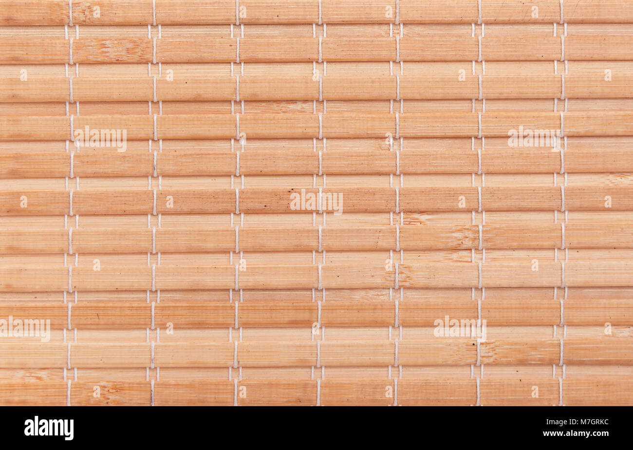 Bamboo tablecloth on the table. A pattern is visible Stock Photo - Alamy