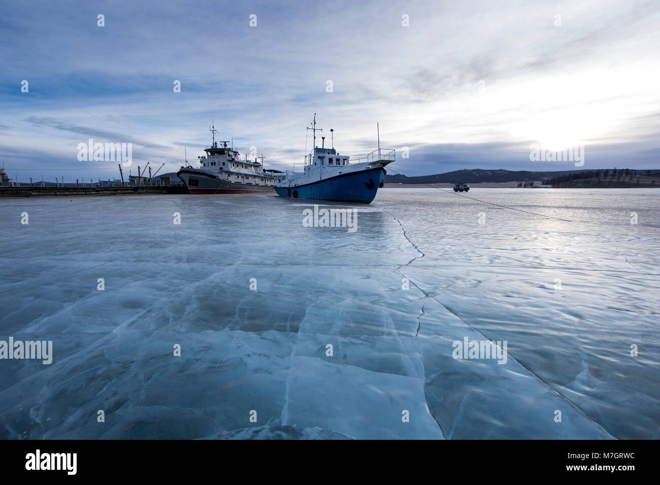 old boat stuck in ice on a frozen lake Khovsgol Stock Photo - Alamy