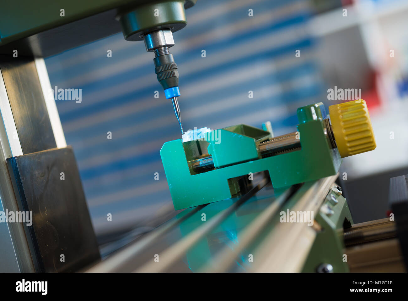 Processing of the plastic workpiece on CNC milling machine Stock Photo ...
