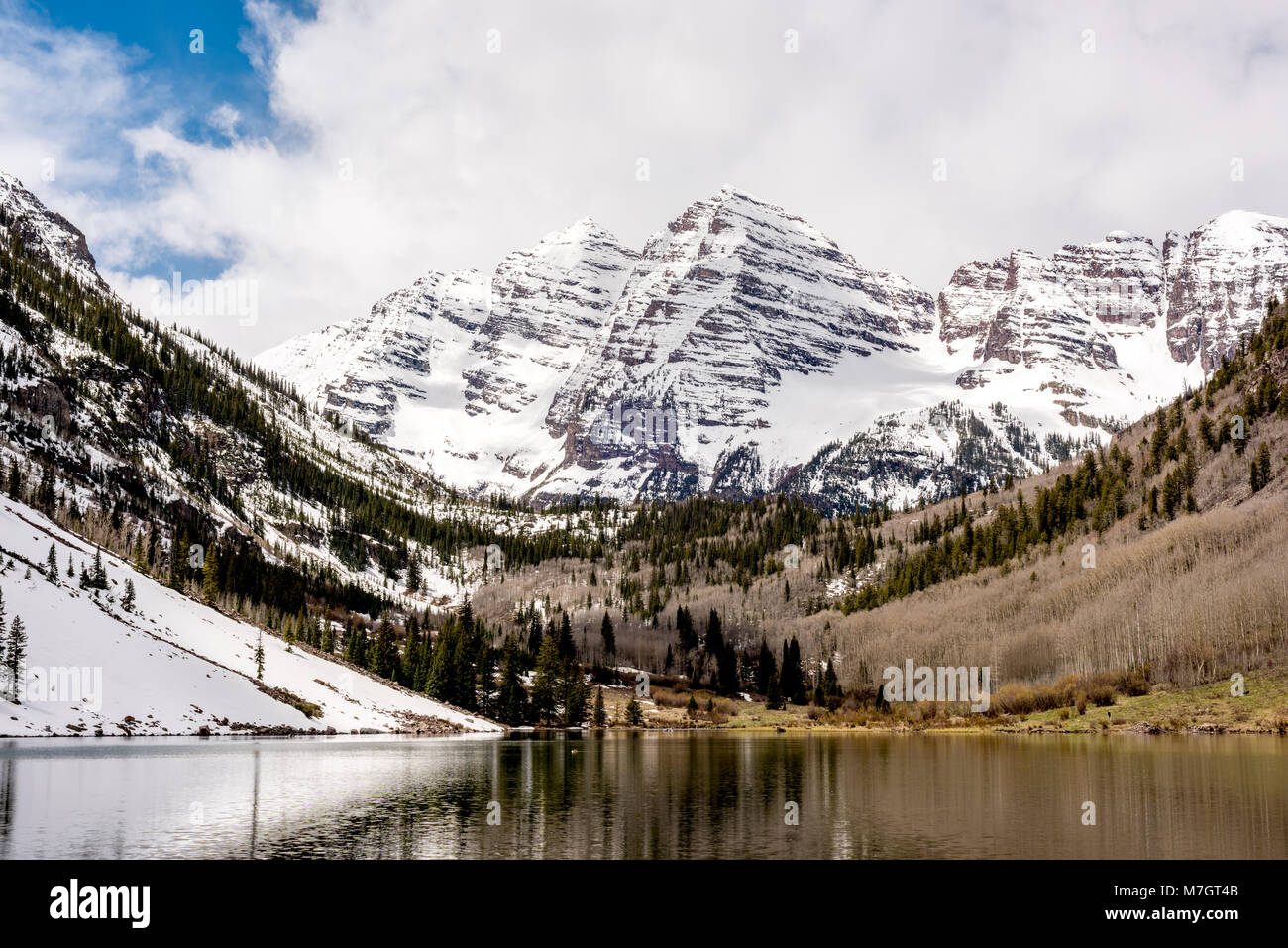 Iconic scene in Colorado with lake and snow covered Rockys Stock Photo ...