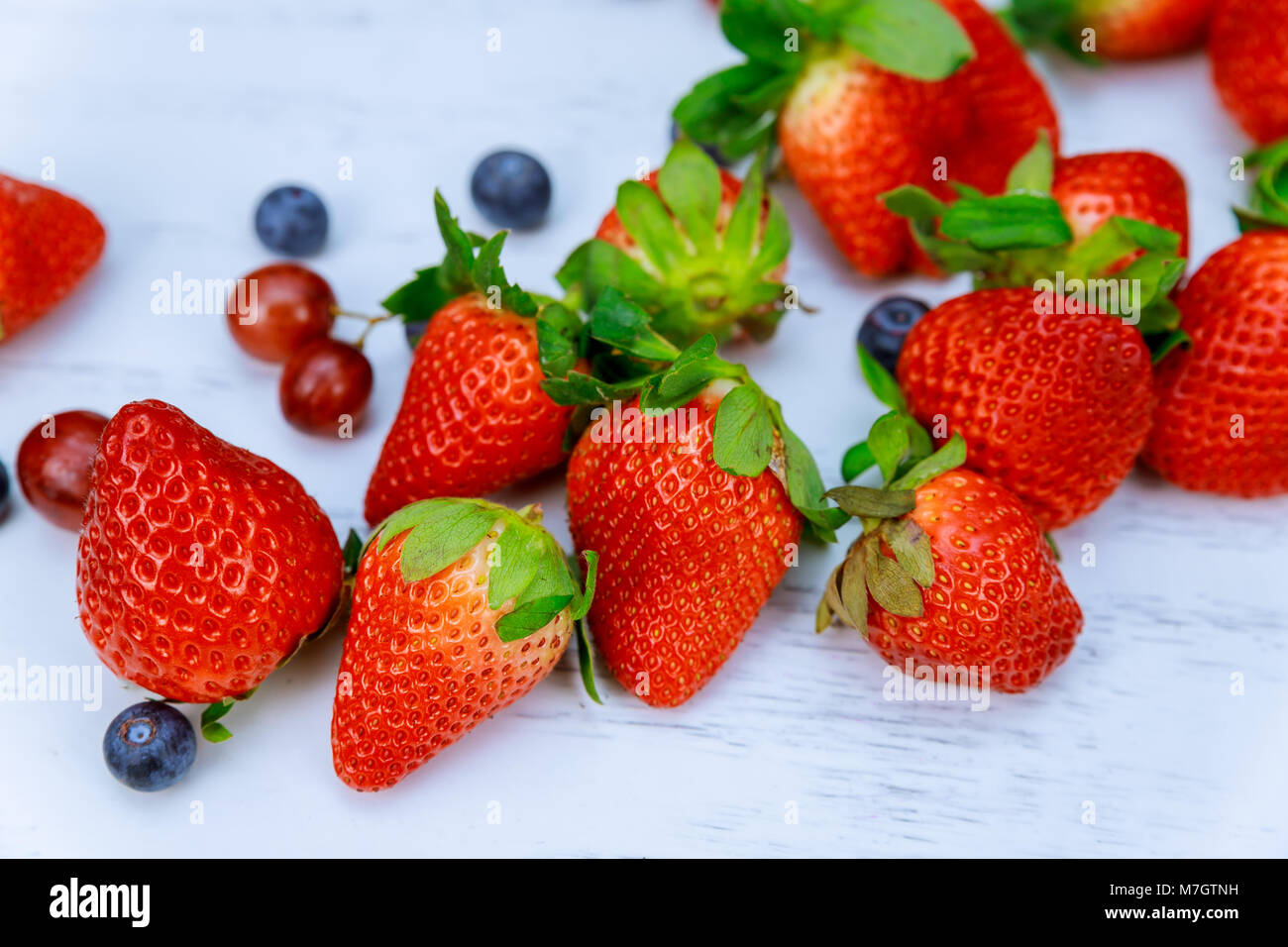 Berries Background. Strawberries, Blueberry, Raspberries, and ...
