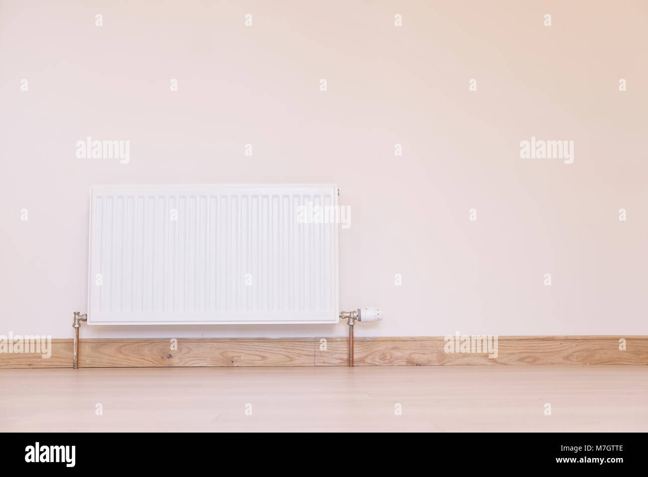 Radiator wall single one plain background white Stock Photo - Alamy