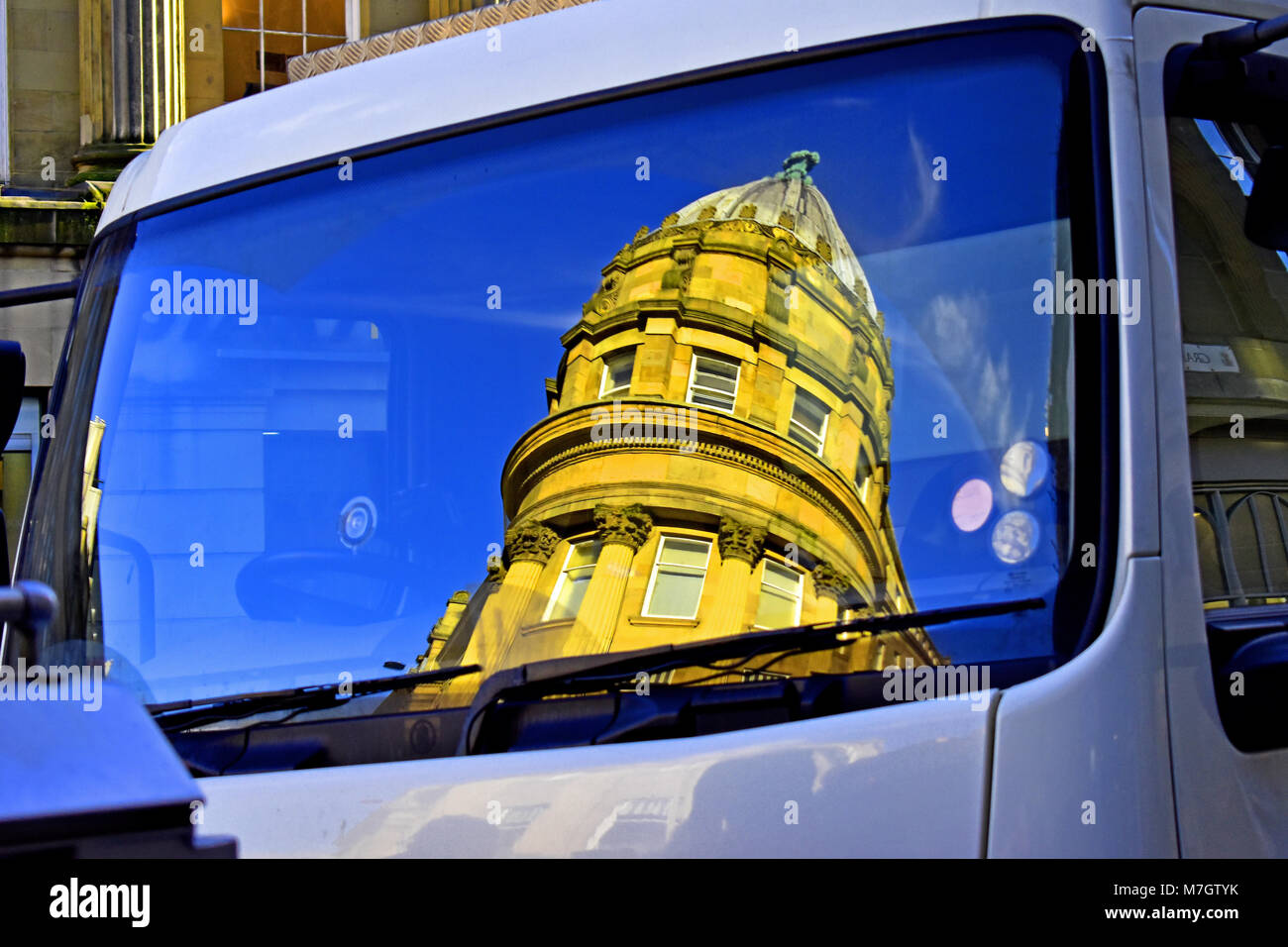 Newcastle historic Grainger St reflection in lorry windscreen Stock ...