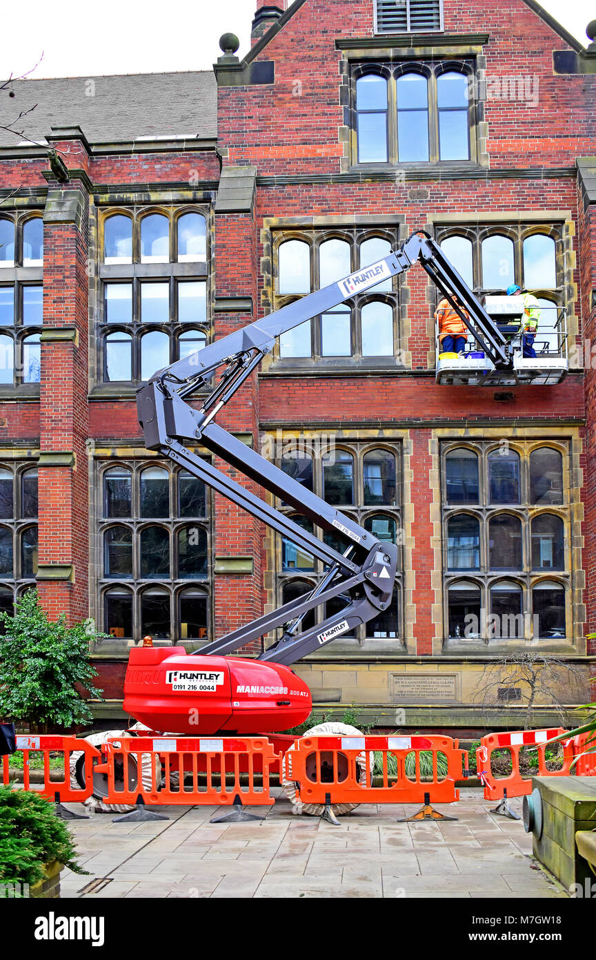 Newcastle historic University cherry picker and window repairs Stock ...