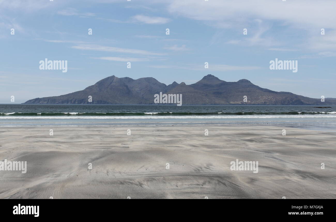 Isle of Rum viewed from Bay of Laig Isle of Eigg Scotland May 2012 ...