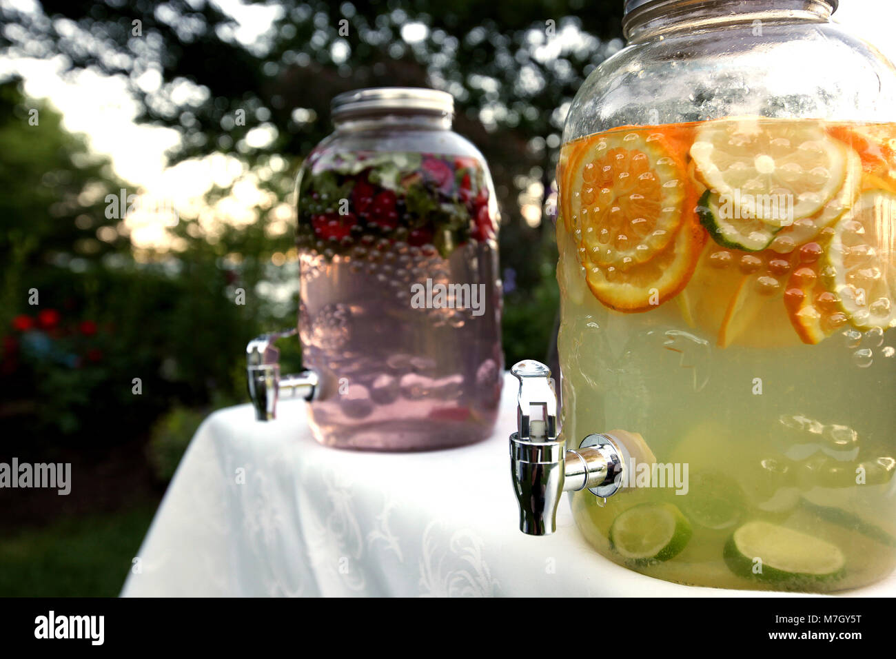 Lemonade and fruit drinks in glass dispensing containers Stock Photo ...