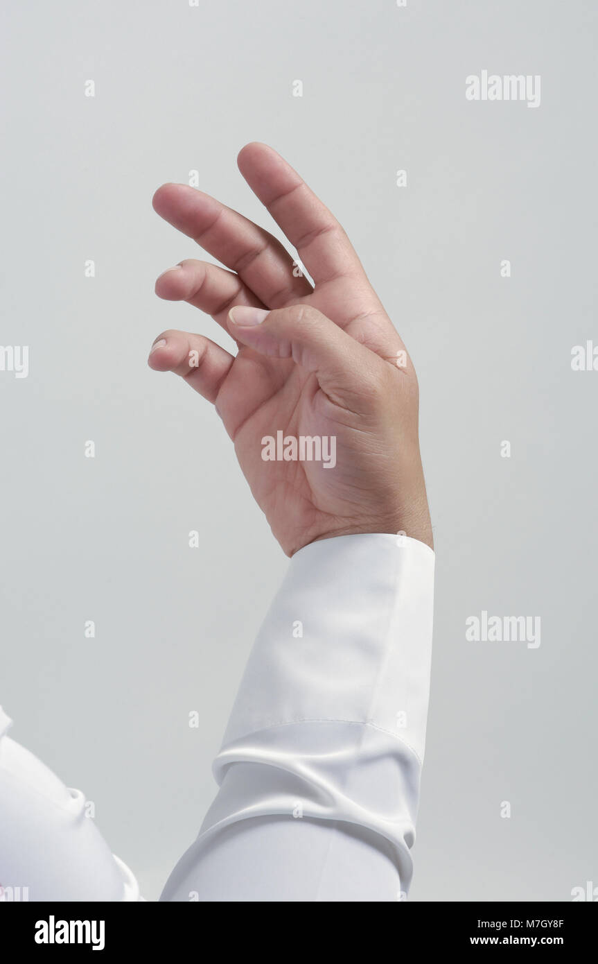 Empty Male Hand For Placing Mobile Phone or Other Object Isolated Close ...