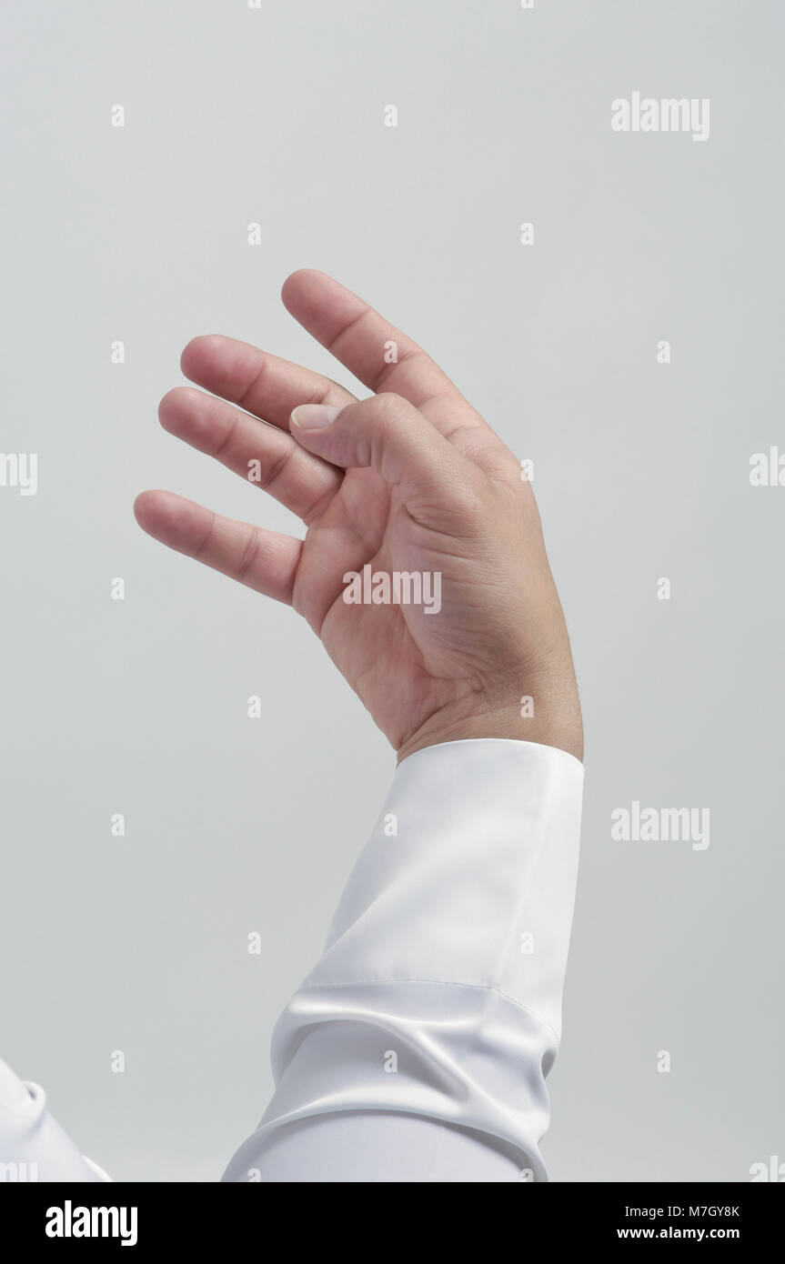 Empty Male Hand For Placing Mobile Phone or Other Object Isolated Close Up Stock Photo - Alamy