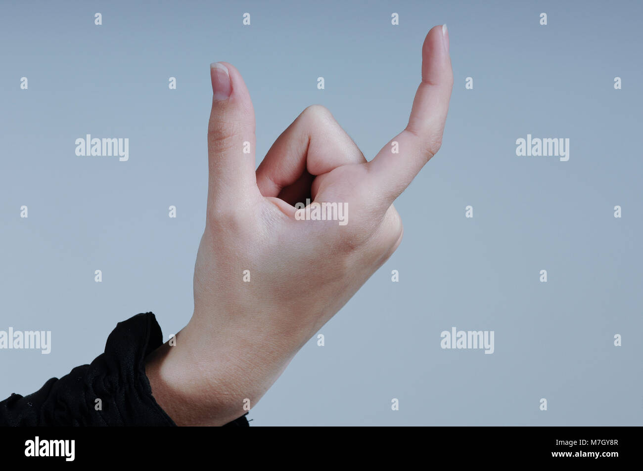 Female Hand Holding Isolated Card with Two Fingers Close Up Stock Photo ...