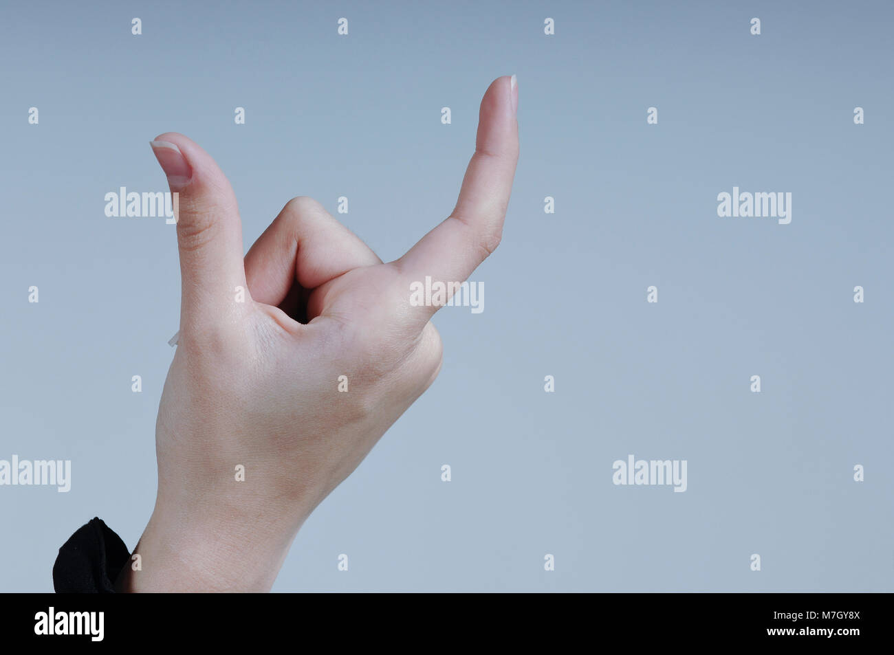 Female Hand Holding Isolated Card with Two Fingers Close Up Stock Photo ...