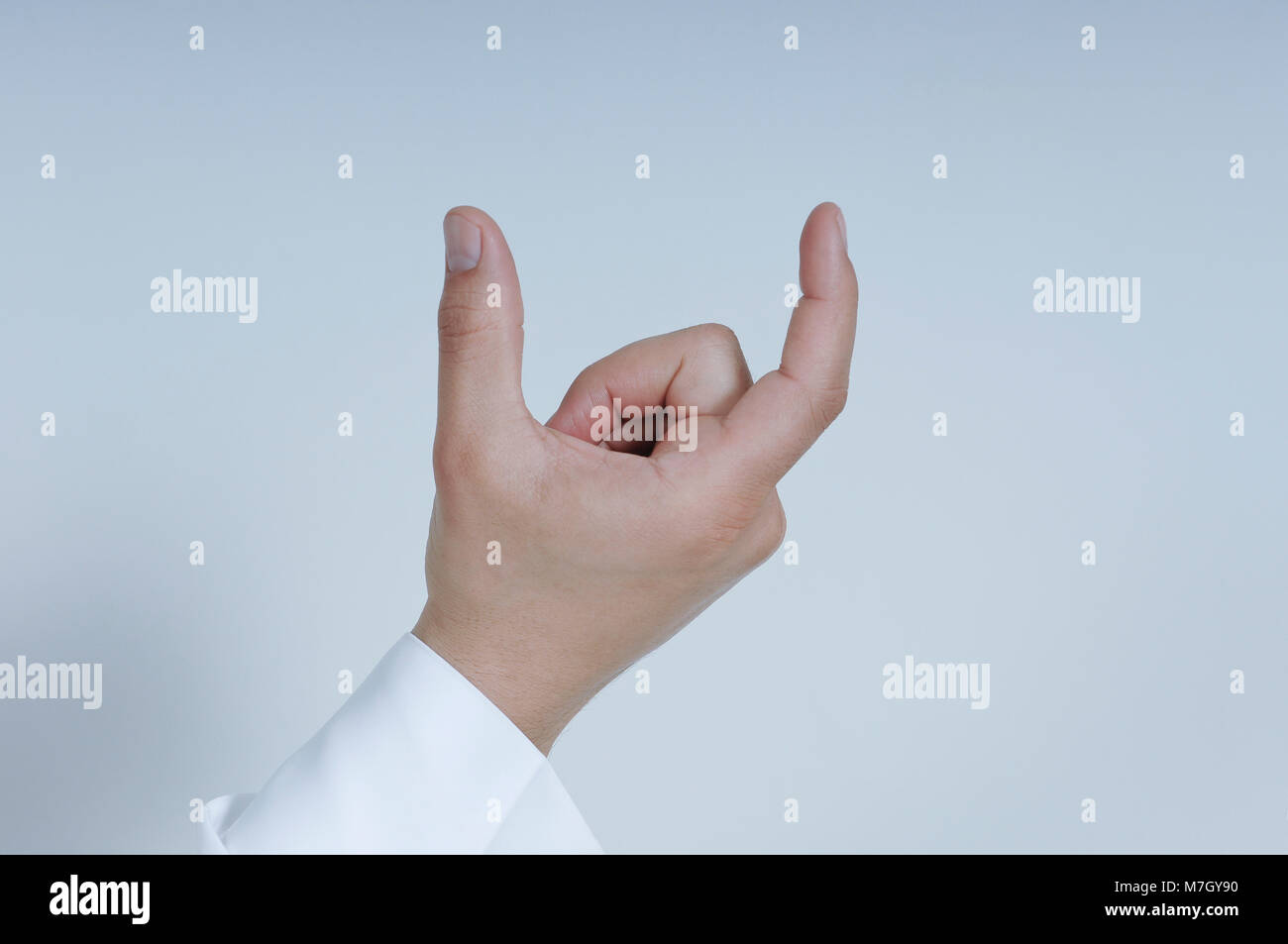 Male Hand Holding Isolated Card with Two Fingers Close Up Stock Photo ...