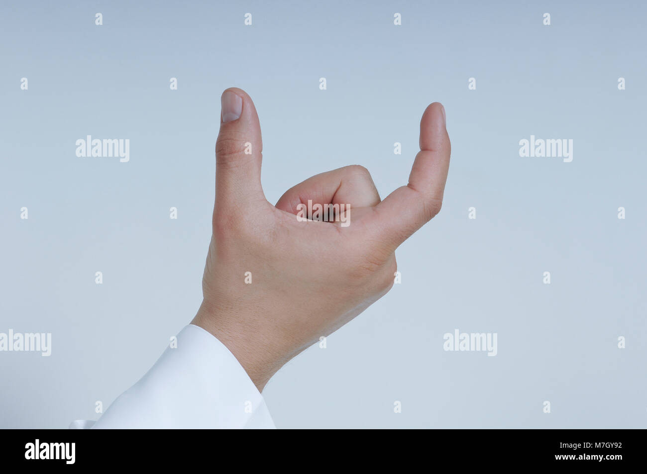 Male Hand Holding Isolated Card with Two Fingers Close Up Stock Photo ...