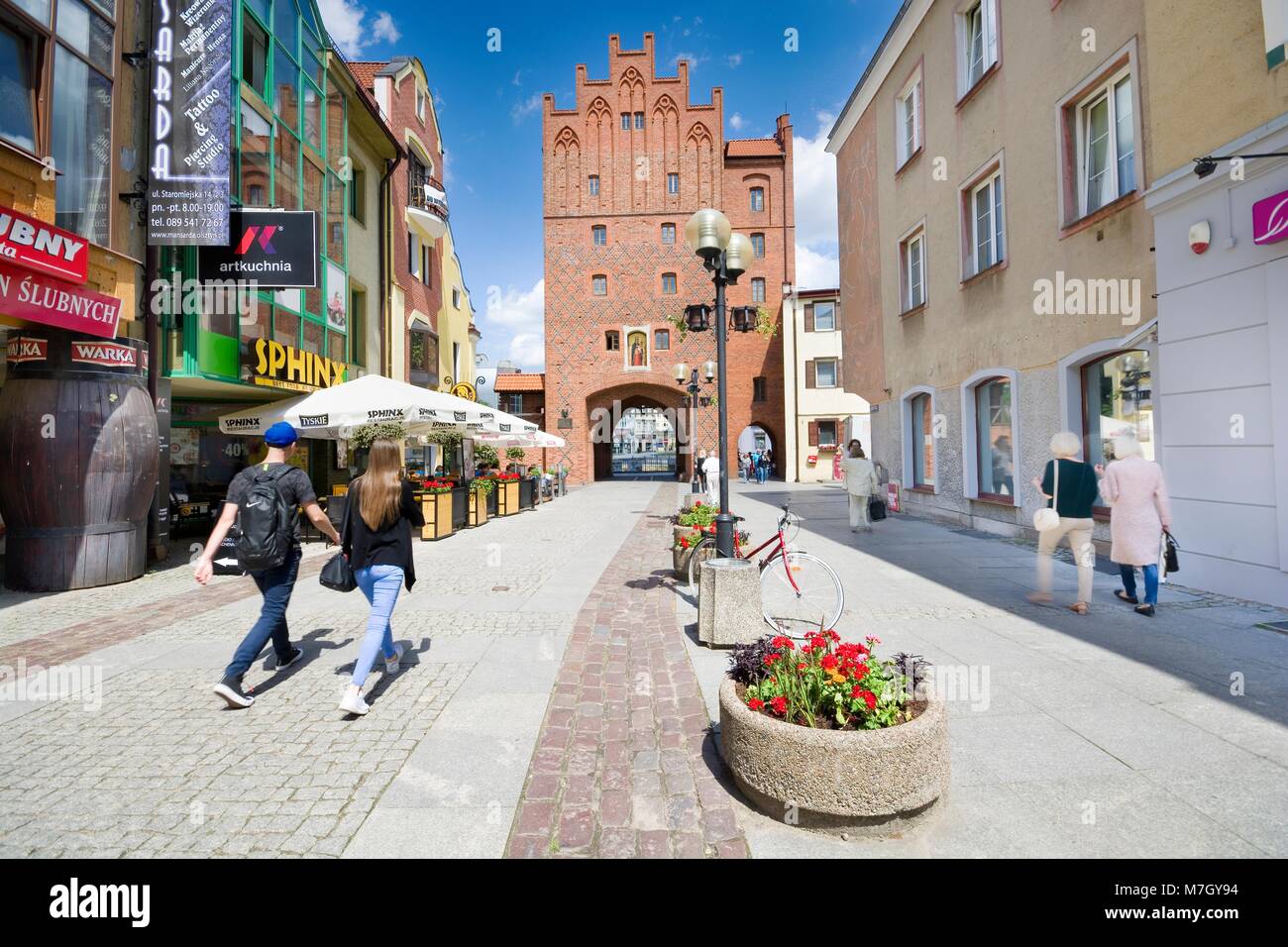 OLSZTYN, POLAND - JUNE 08, 2017: Cobbled walkway ended with Gothic ...