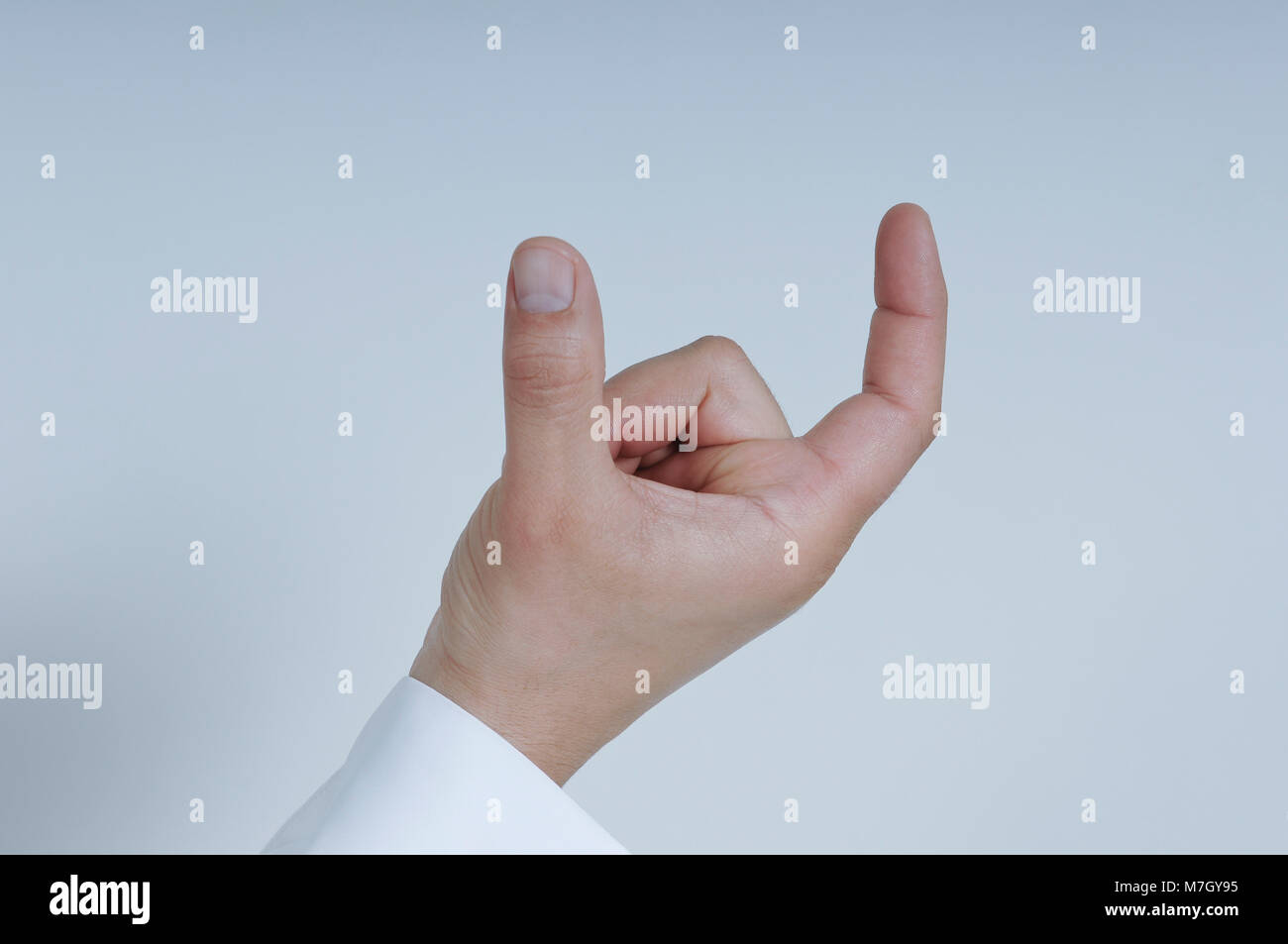 Male Hand Holding Isolated Card with Two Fingers Close Up Stock Photo ...