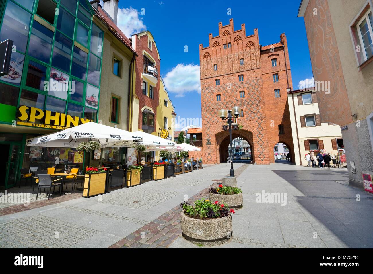 OLSZTYN, POLAND - JUNE 08, 2017: Cobbled walkway ended with Gothic ...