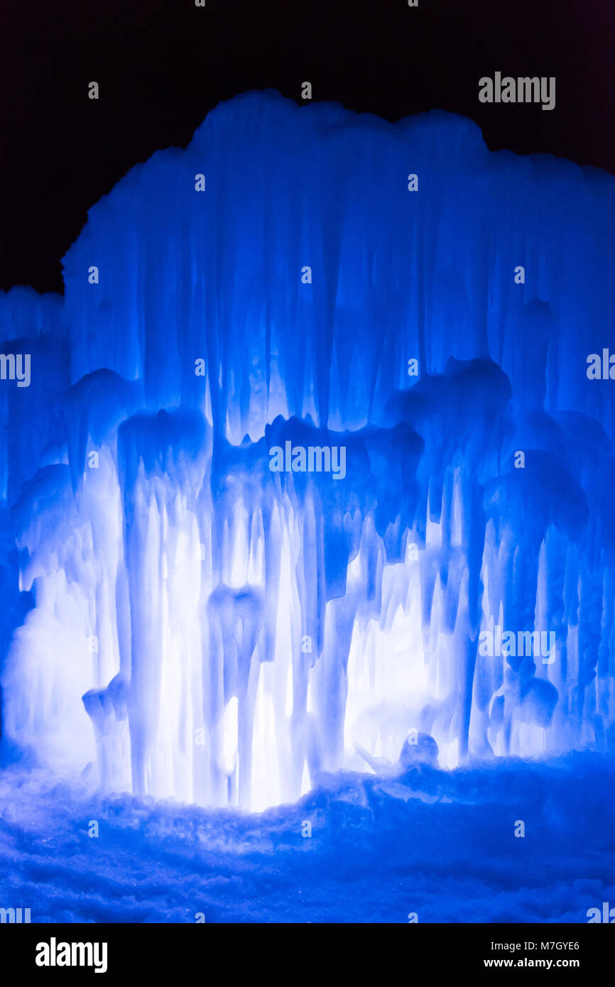 Colorful ice castle formations at night time Stock Photo - Alamy