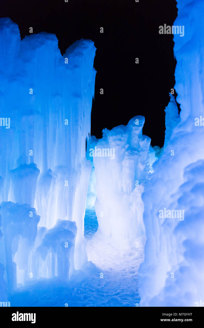 Colorful ice castle formations at night time Stock Photo - Alamy