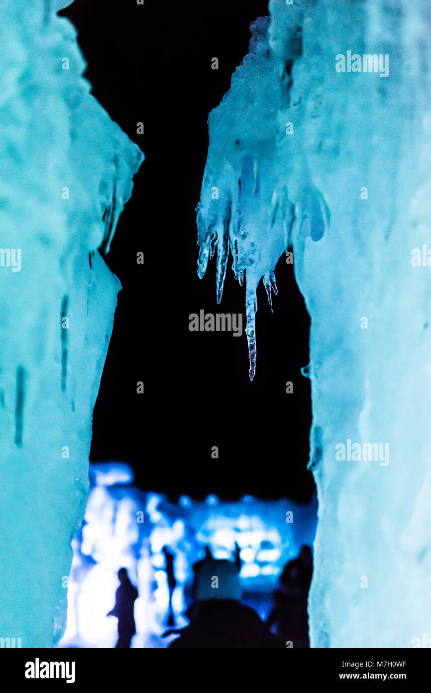 Colorful ice castle formations at night time Stock Photo - Alamy