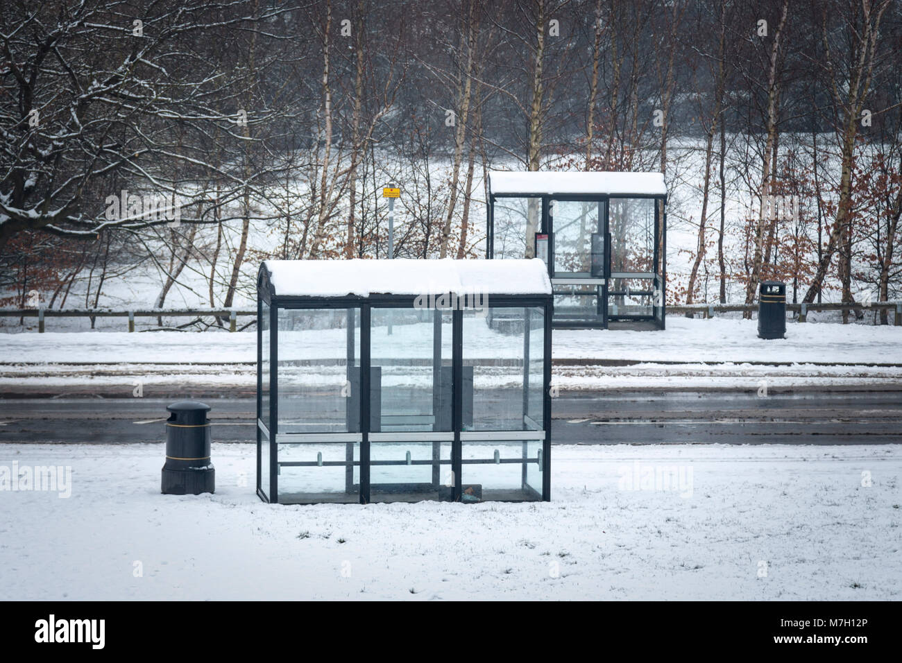 Waiting for bus snow hi-res stock photography and images - Alamy