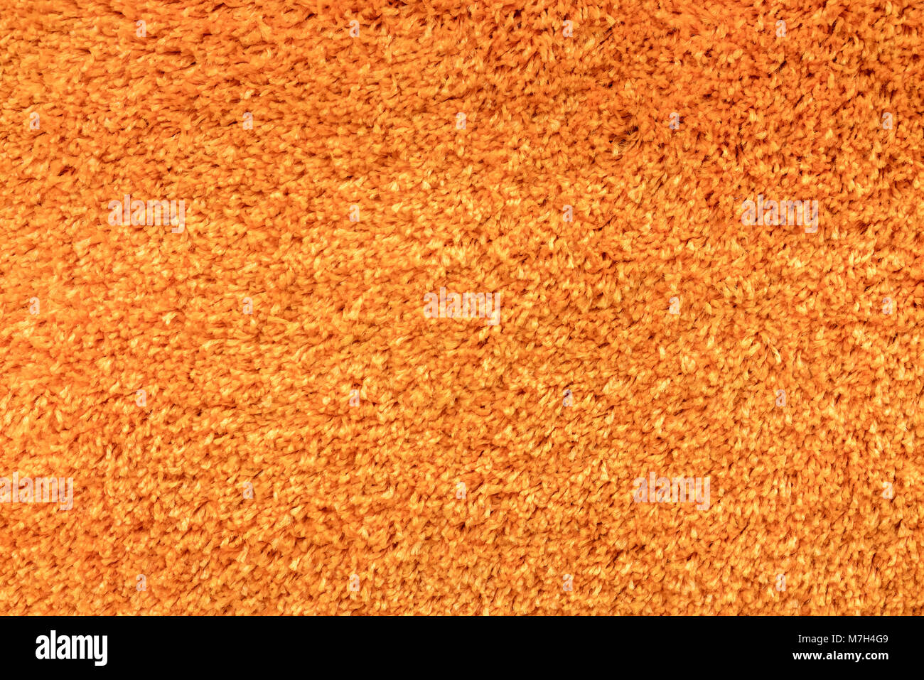 Orange rag background. Blurry Stock Photo - Alamy