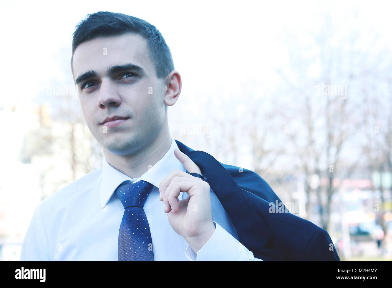 Stylish modern guy standing hi-res stock photography and images - Alamy