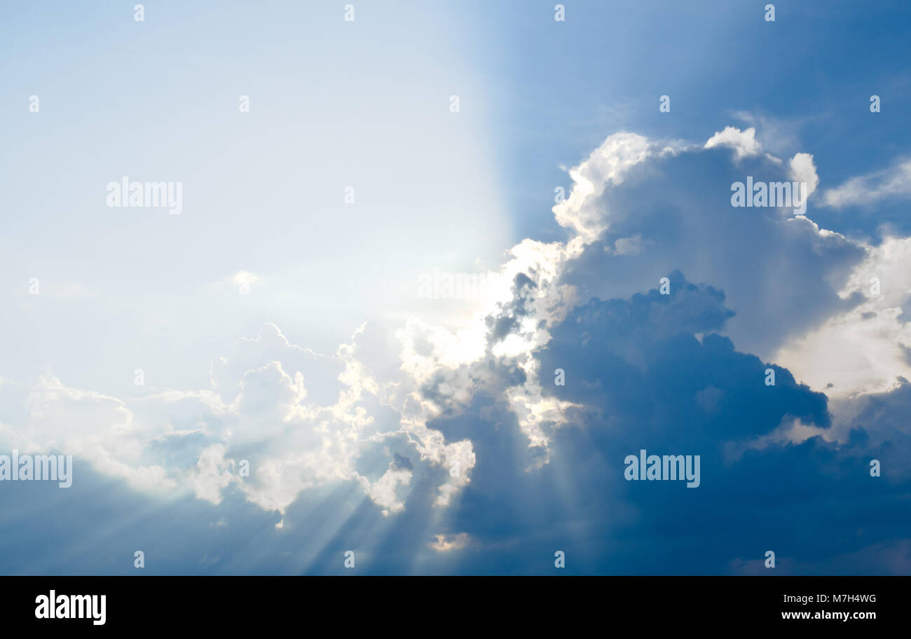 Blue sky & clouds with sun rays, bright & shining, Good for travel or ...