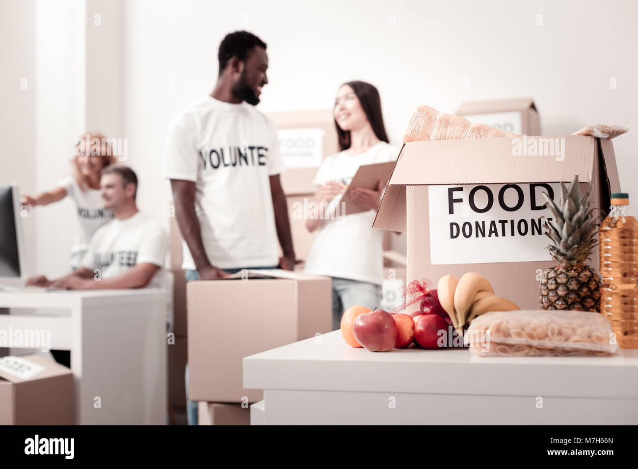 Group of positive colleagues that doing their job Stock Photo - Alamy