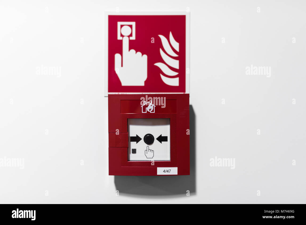 Red Fire alarm button on white wall Stock Photo - Alamy