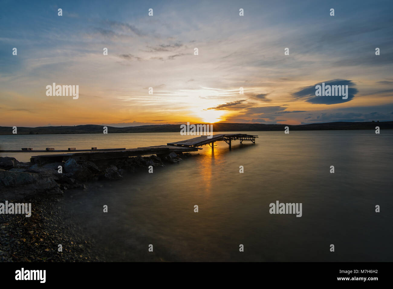 Sundawn at lake Stock Photo - Alamy