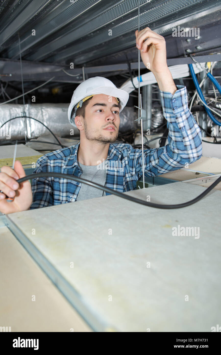 Fixing light fitting hi-res stock photography and images - Alamy