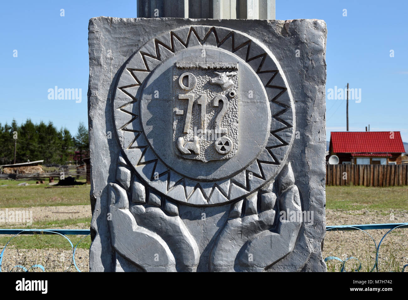 The monument celebrating the pole of cold in the little town of Tomtor ...