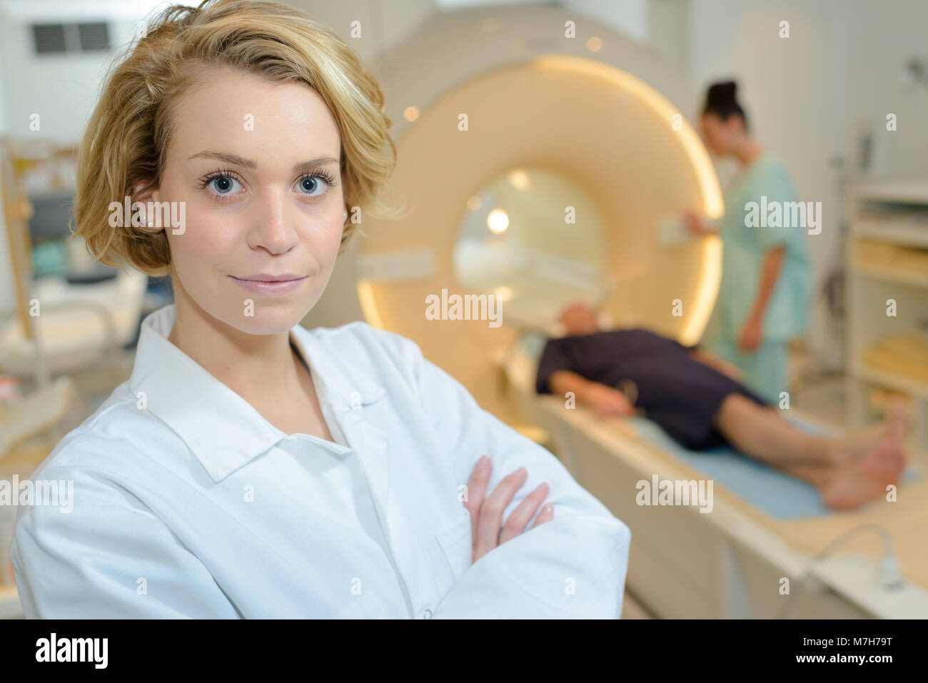 female doctor looking at camera in mri room of hospital Stock Photo - Alamy