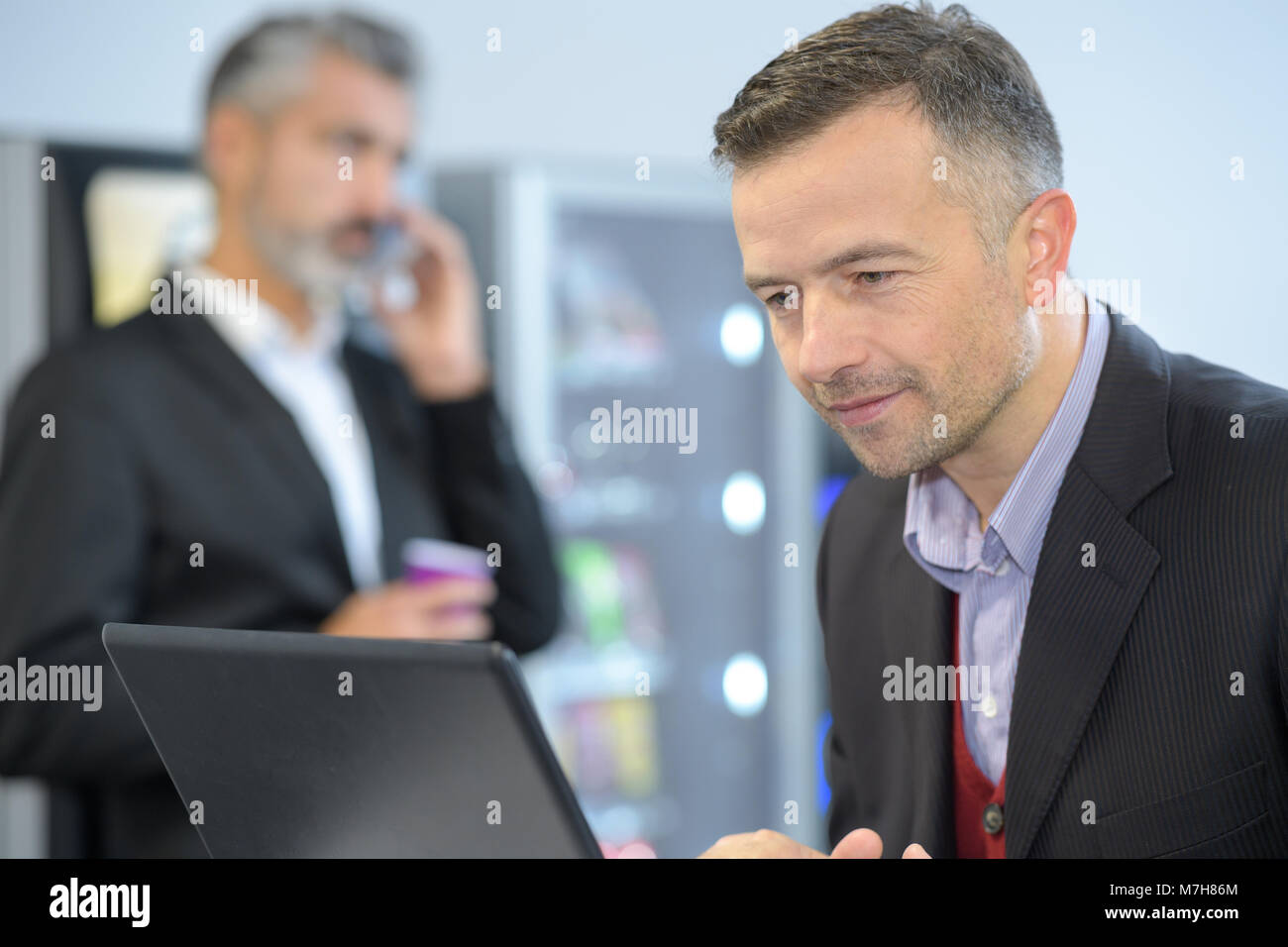 businessmen in office Stock Photo - Alamy