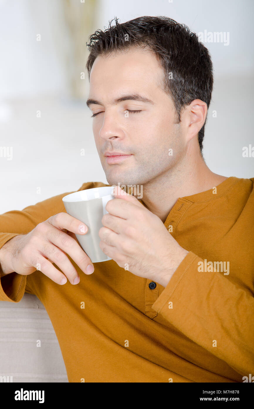 man enjoying a cup of coffee Stock Photo - Alamy