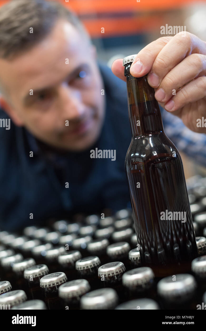 beer bottling factory employee Stock Photo - Alamy